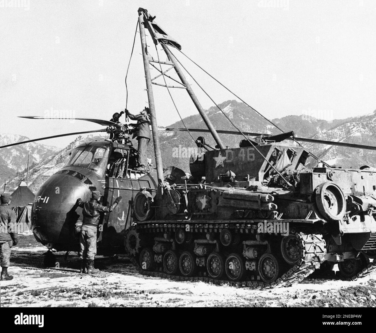 Changing the roto head a transport helicopter near the front lines in ...