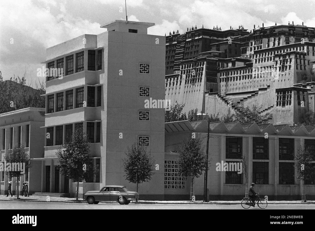 New and Old. Anew building casts a dramatic contrast with the centuries ...