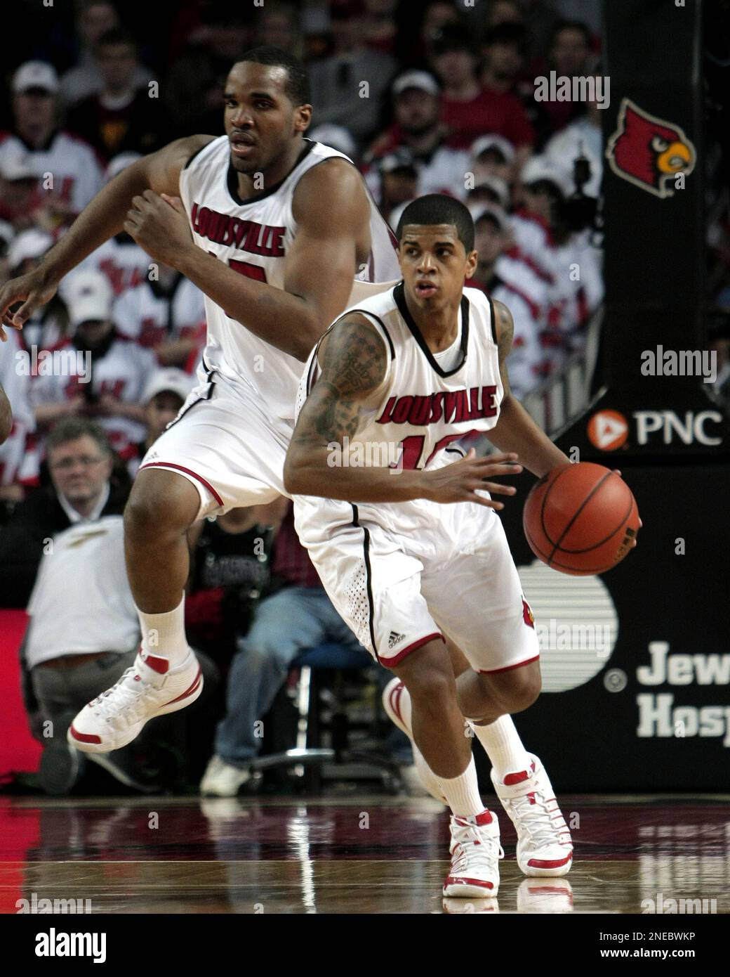 Louisville guard Edgar Sosa (10) heads up court after a steal afainst ...