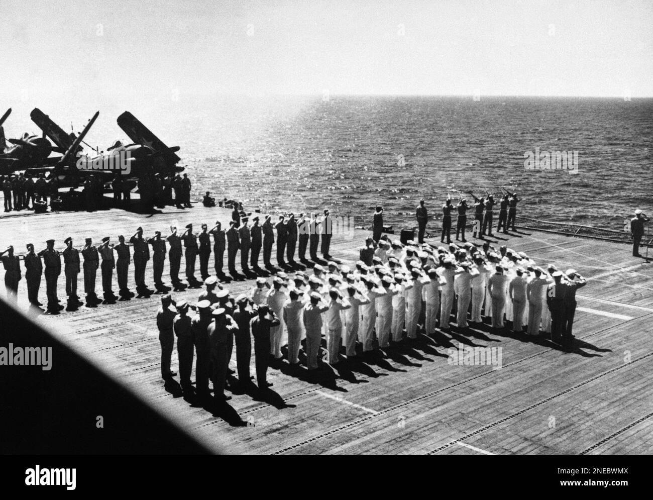 U.S. Navy personnel salute their dead in impressive sunset memorial ...