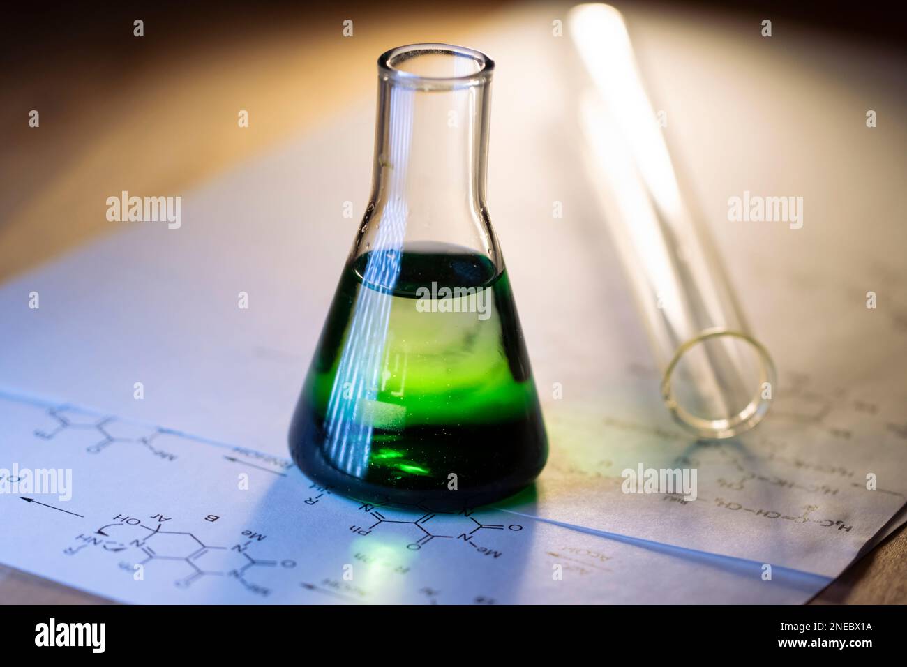 Chemical tubes with reaction formulas Stock Photo - Alamy
