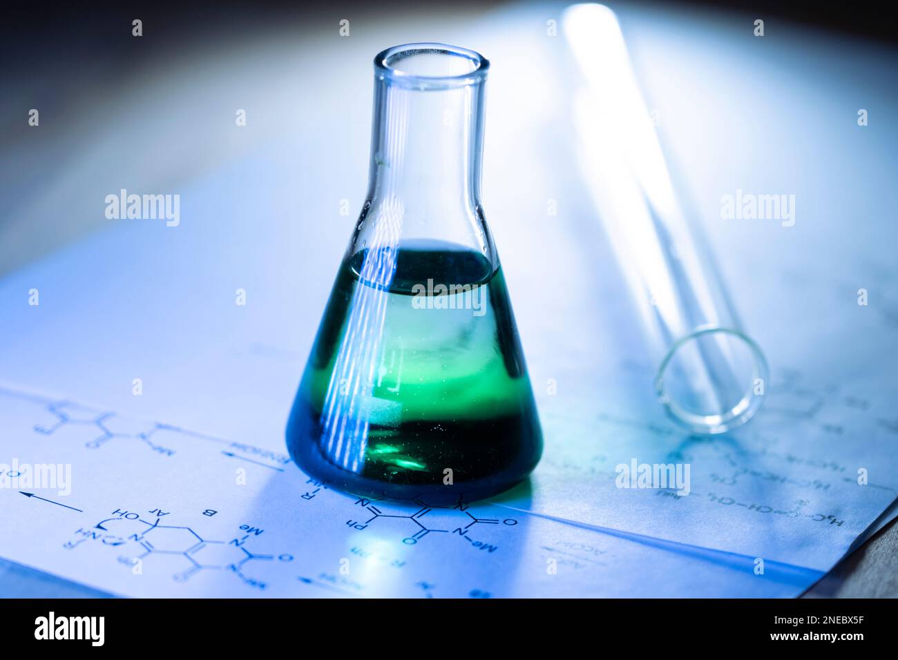 Chemical tubes with reaction formulas Stock Photo - Alamy