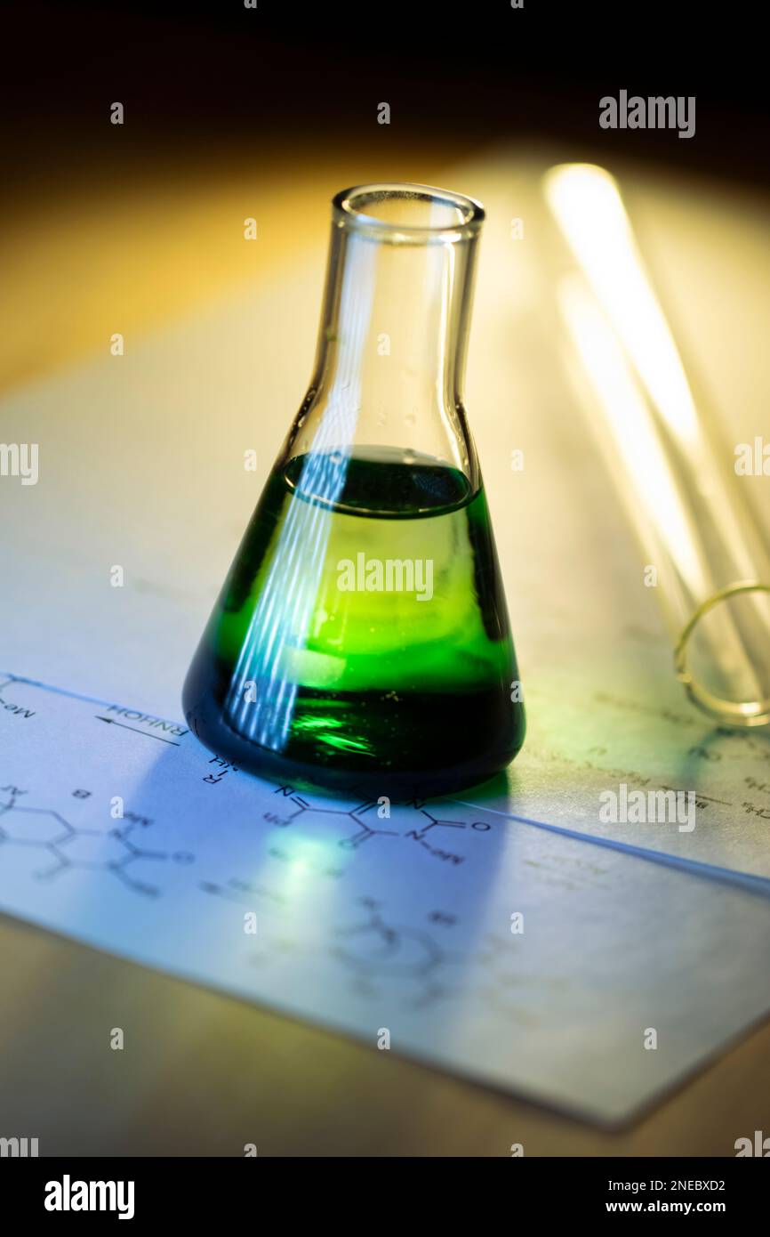 Chemical tubes with reaction formulas Stock Photo - Alamy