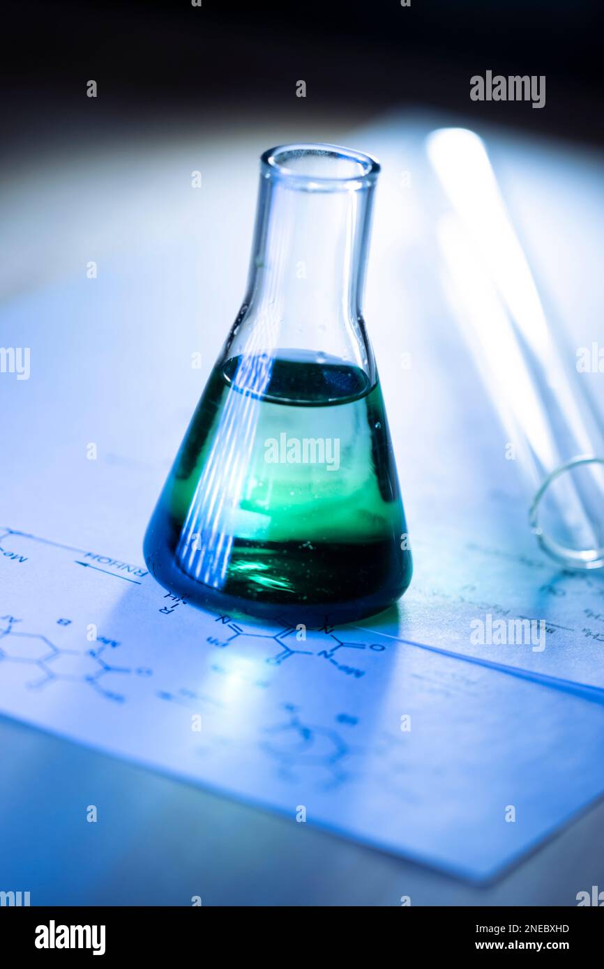 Chemical tubes with reaction formulas Stock Photo - Alamy