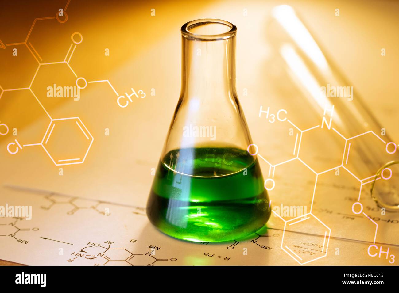 Chemical tube with reaction formula in light Stock Photo - Alamy
