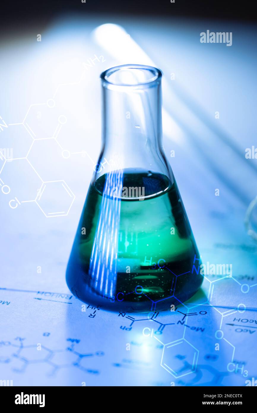 Chemical tubes with reaction formulas Stock Photo - Alamy