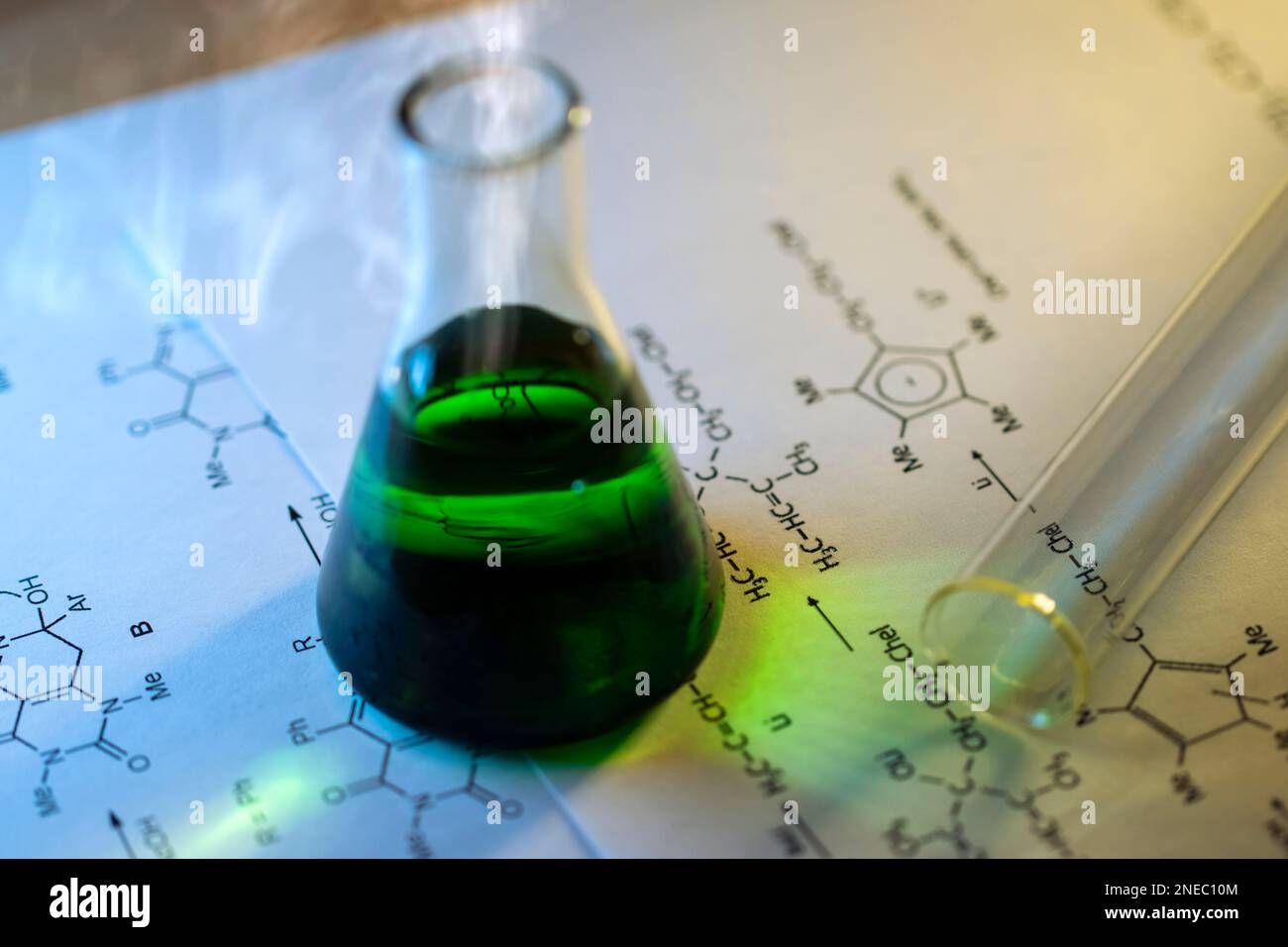 Chemical tubes with reaction formulas Stock Photo - Alamy