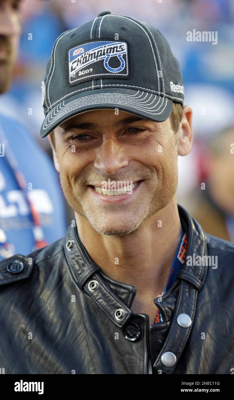 Actor Rob Lowe walks on the sidelines at Sun Life Stadium in Miami ...