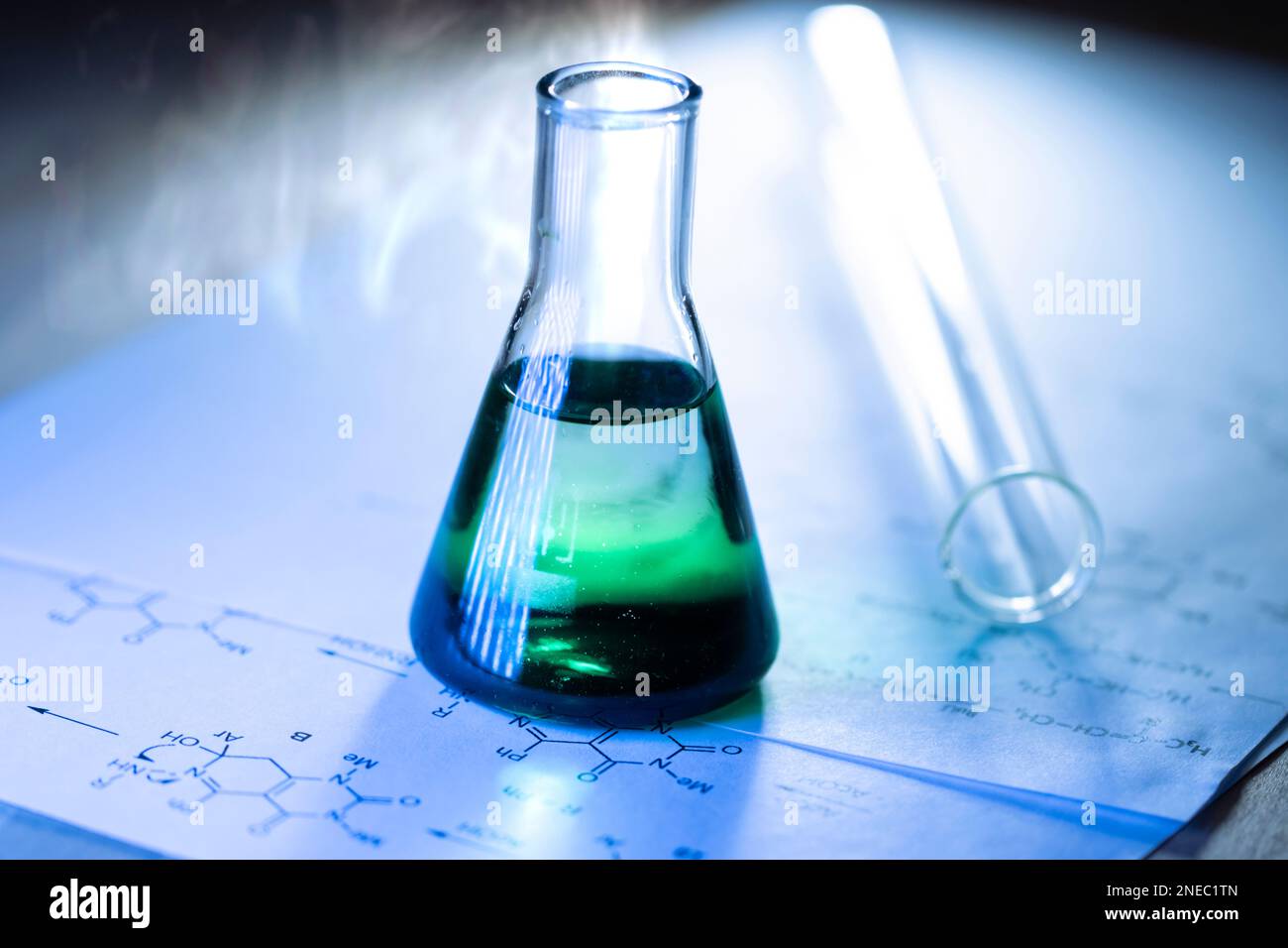 Chemical tubes with reaction formulas Stock Photo - Alamy
