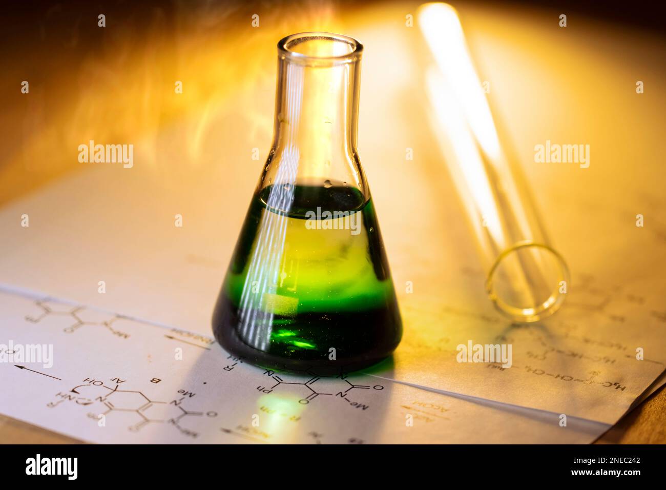 Chemical tubes with reaction formulas Stock Photo - Alamy