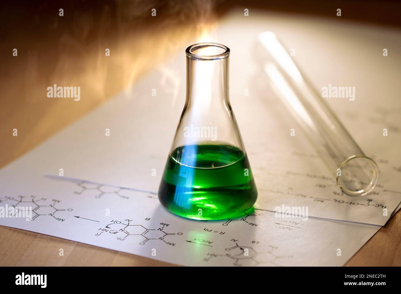 Chemical tubes with reaction formulas Stock Photo - Alamy