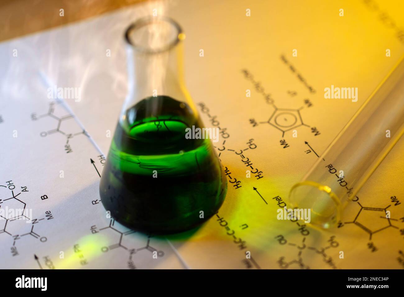 Chemical tubes with reaction formulas Stock Photo - Alamy