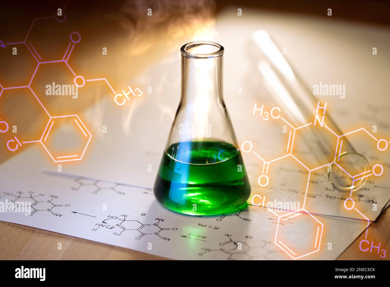 Chemical tube with reaction formula in light Stock Photo - Alamy