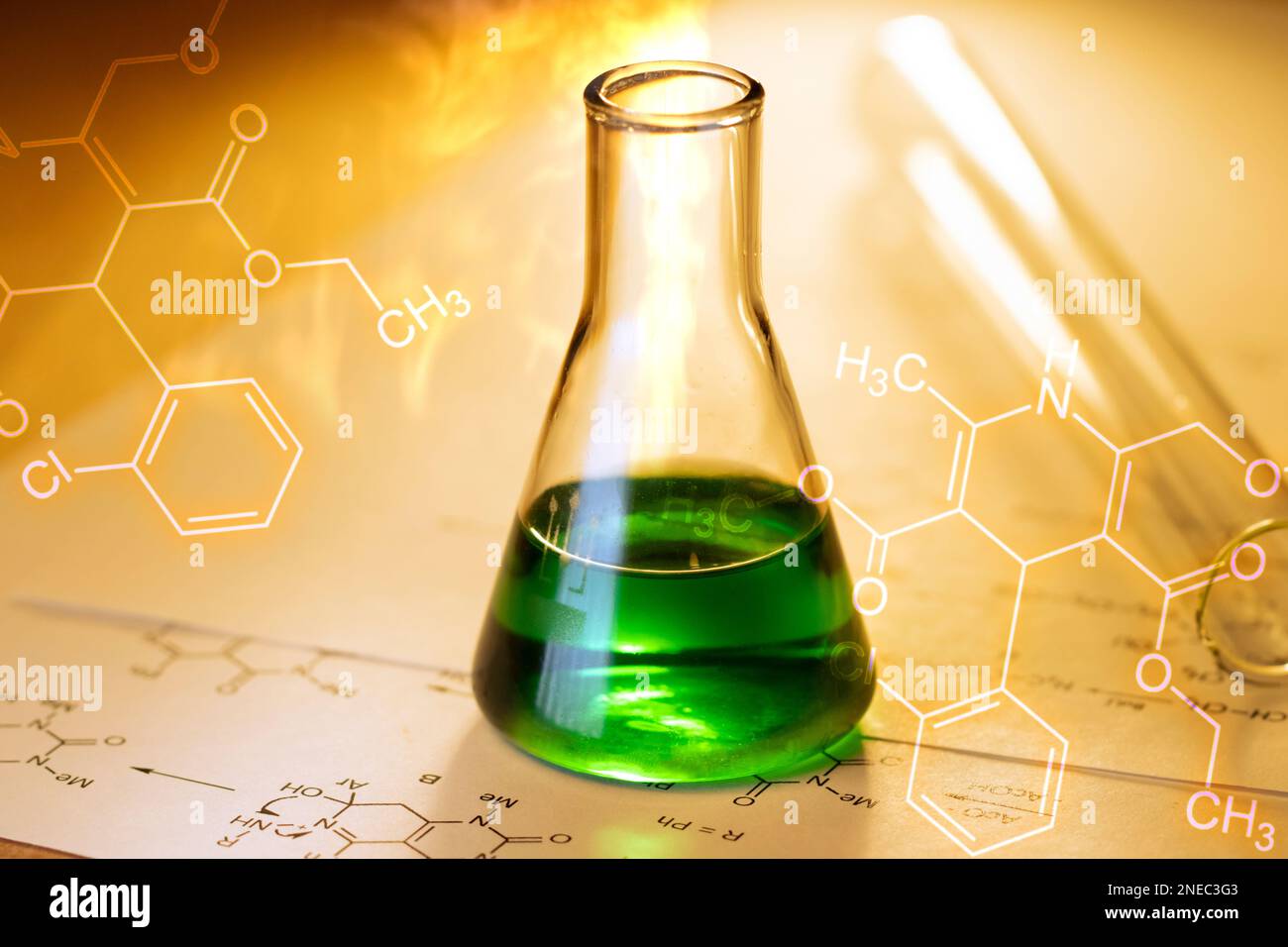 Chemical tube with reaction formula in light Stock Photo - Alamy