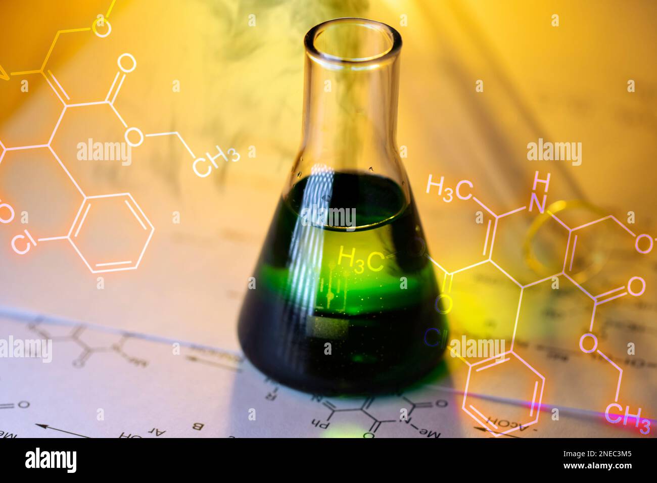 Chemical tube with reaction formula in light Stock Photo - Alamy