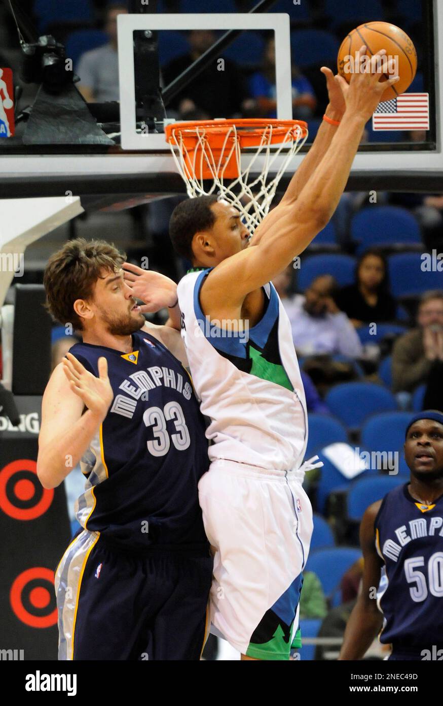 Minnesota Timberwolves' Ryan Hollins, right, grabs the rebound in front ...