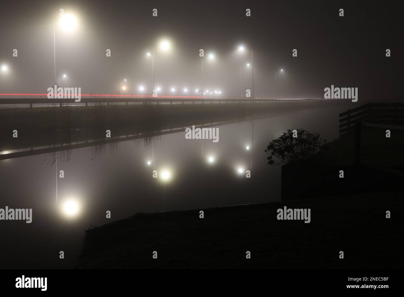 An aerial view of road with lights in night Stock Photo - Alamy