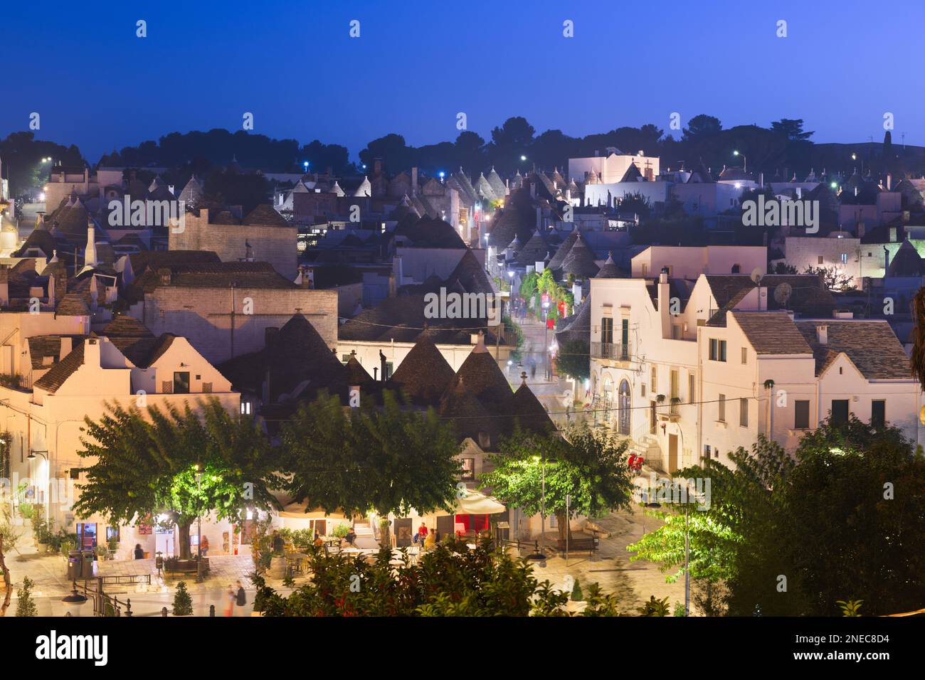 Alberobello, Italy with Trulli houses at dusk Stock Photo - Alamy