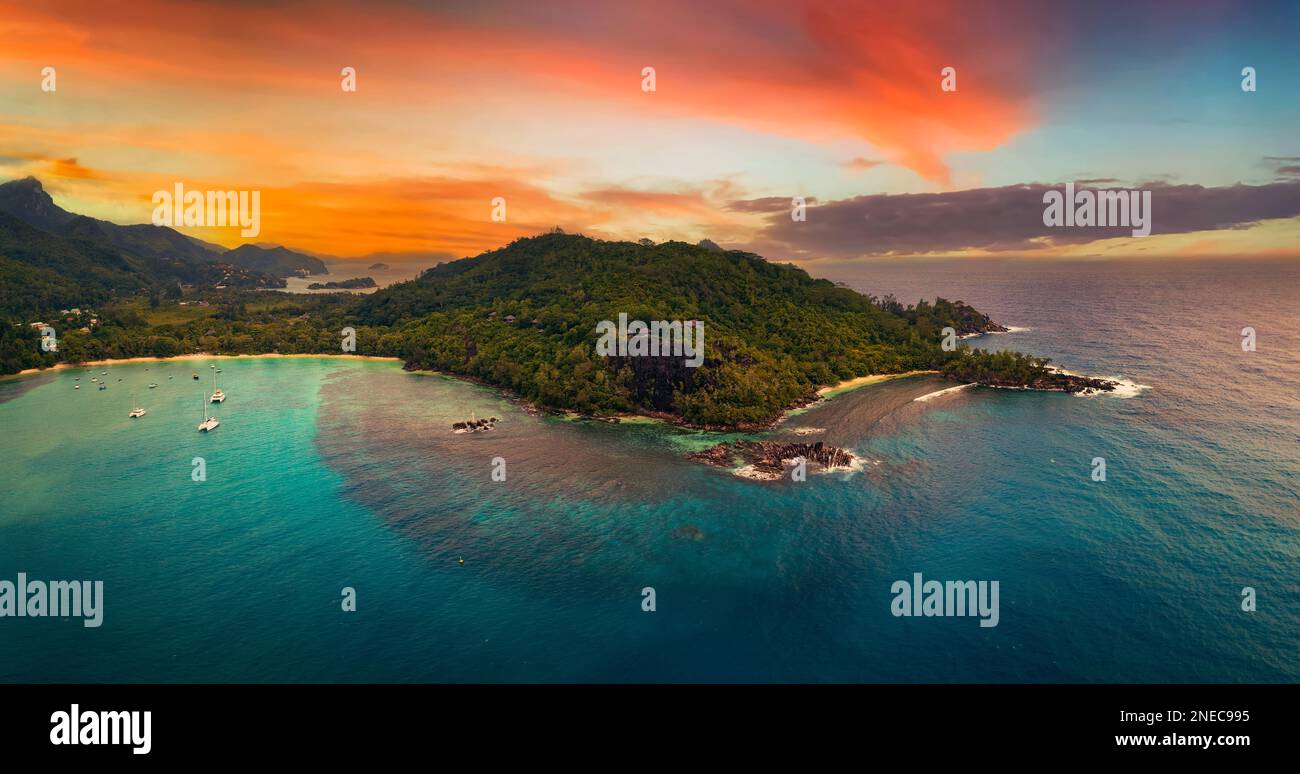 Aerial sunset view of Port Launay Beach at Mahe Island, Seychelles ...