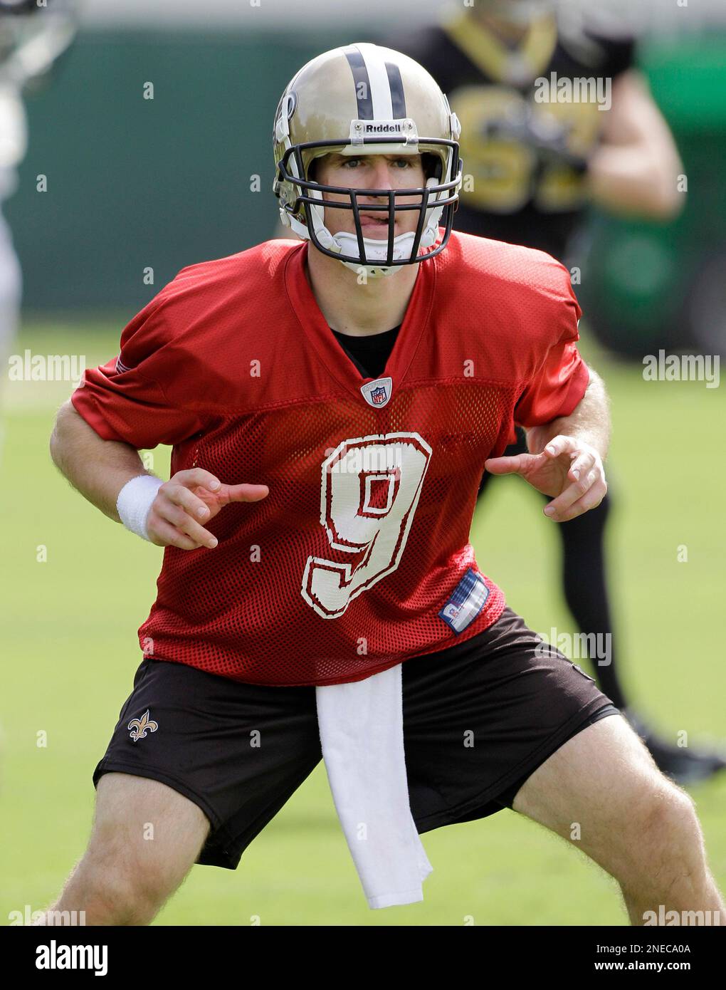 New Orleans Saints quarterback Drew Brees stretches during football ...