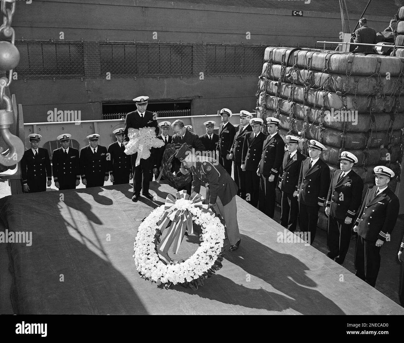 Nation?s first Korean War dead reaches U.S. Navy officers stand at ...
