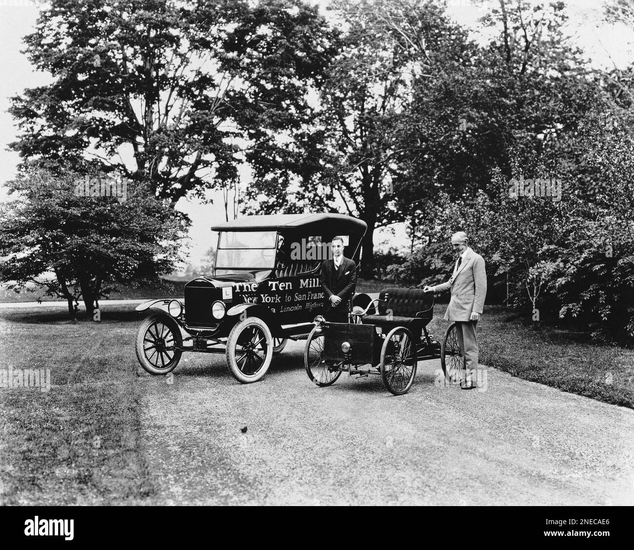 Henry Ford and his son, Edsel, then President of the company, posed ...