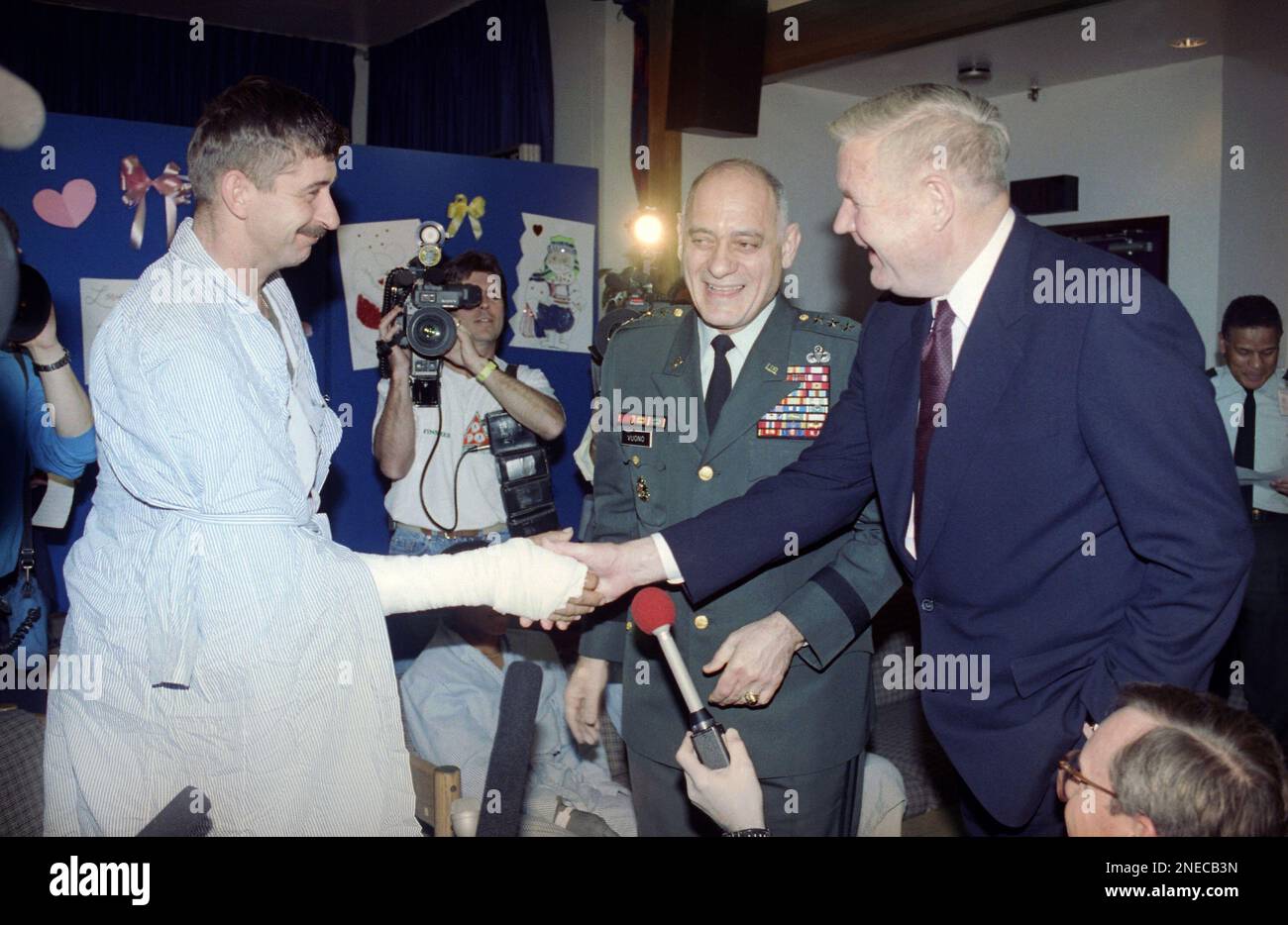 P.K. Kruczkiewicz of Uniontown, Pa., left, shakes hands with Rep. John ...