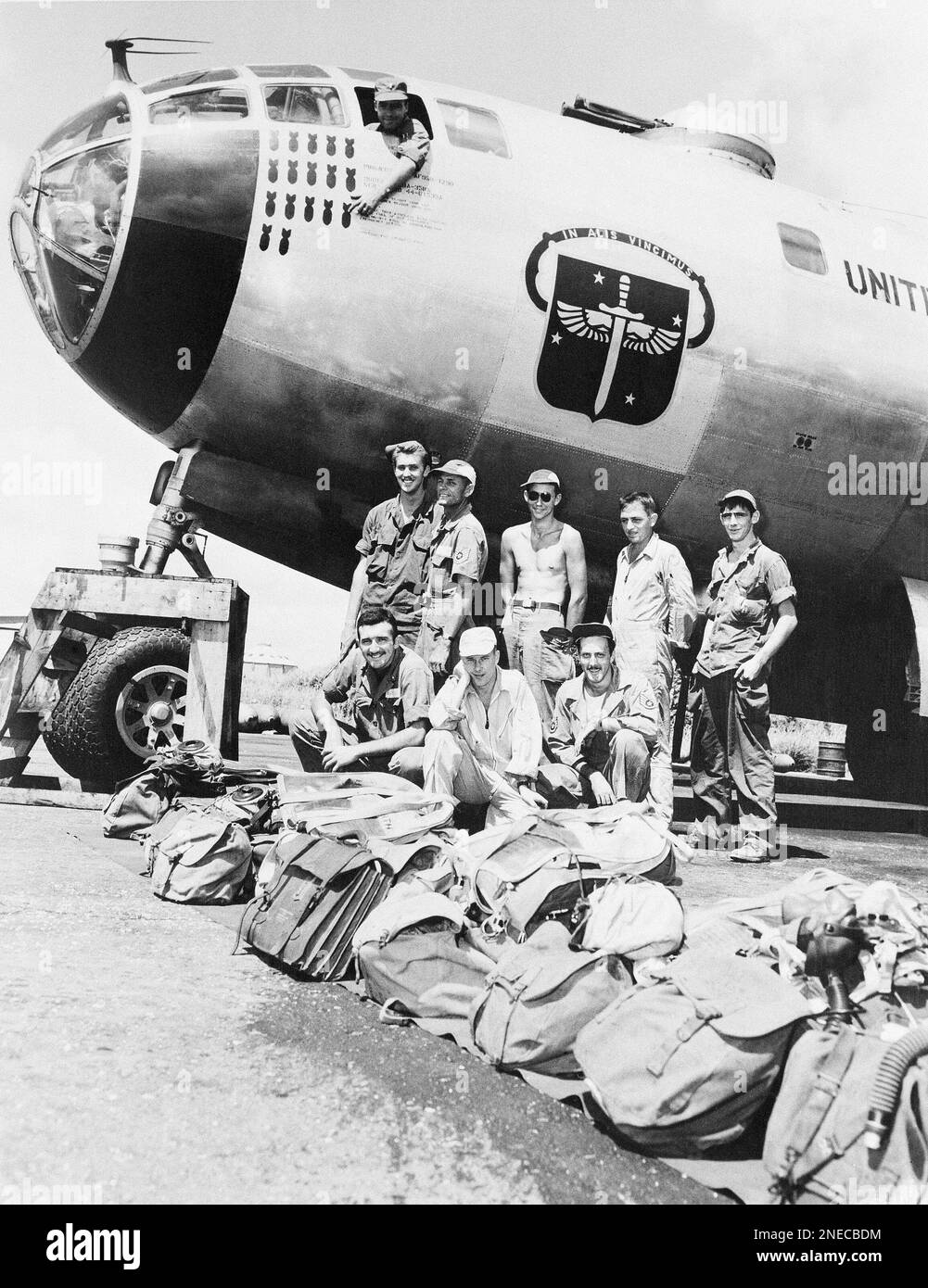 Lt. David A. Austin, of Duluth, Minn., leans from cockpit of his B-29 ...