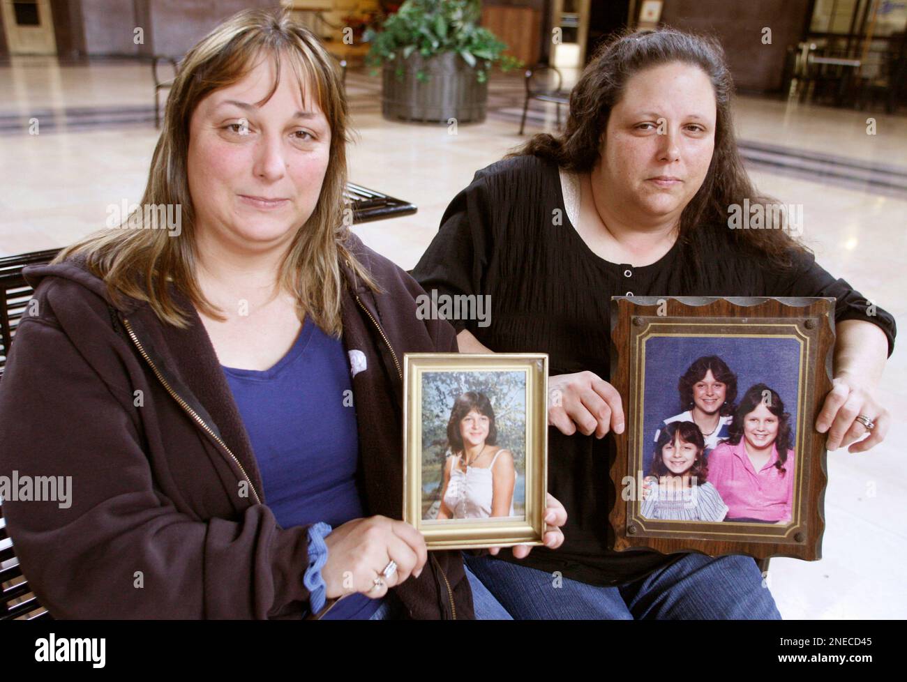 Stephanie Clack, left, and Alice Beverly hold photos showing their ...