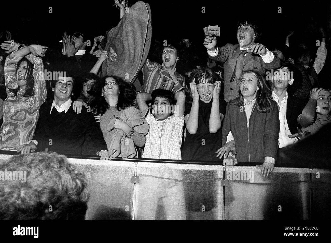 Youth are howling and screaming in enthusiasm over the British Rolling ...