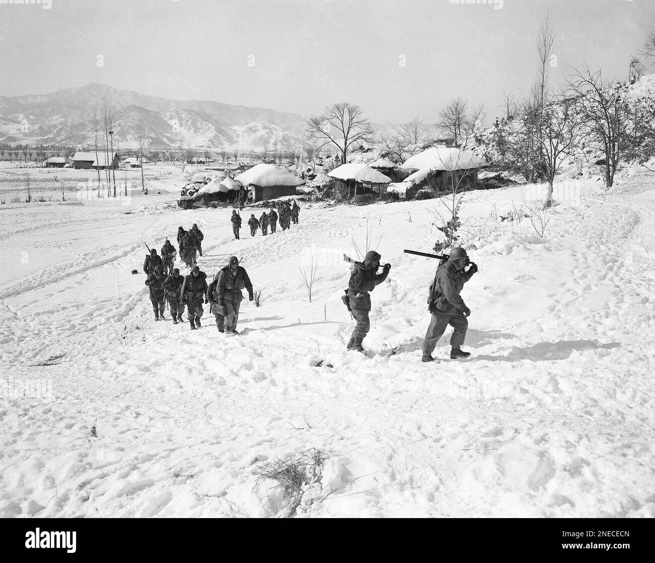 Well-armed infantrymen move up hill in Wonju front sector, South Korea ...