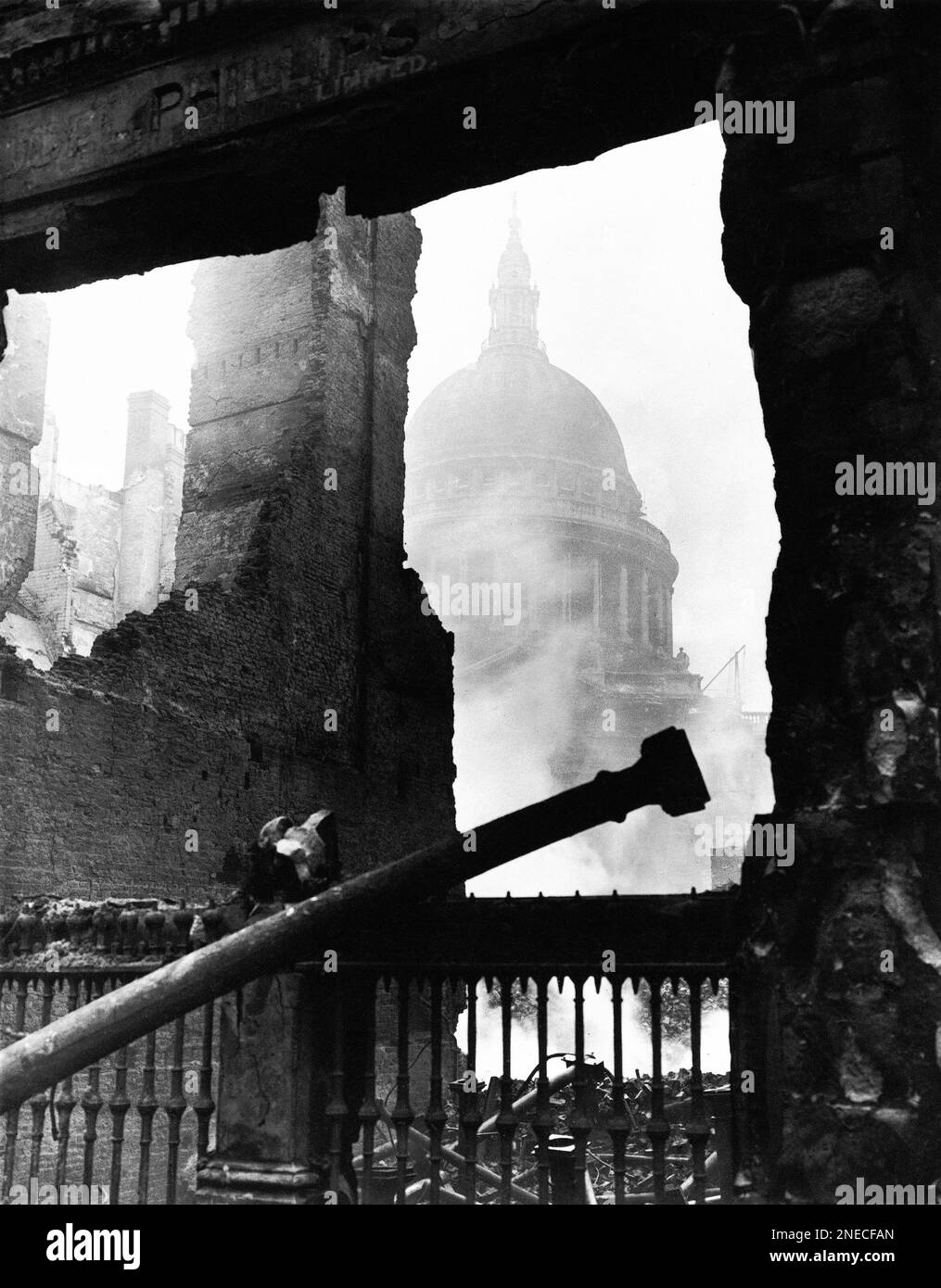 Dome of St. Paul?s Cathedral framed between jagged walls of building ...