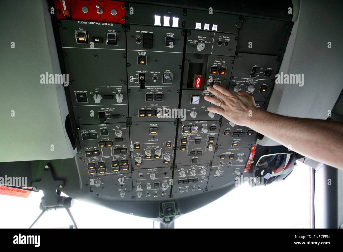 Instruments line an overhead panel in the cockpit of the first Boeing ...