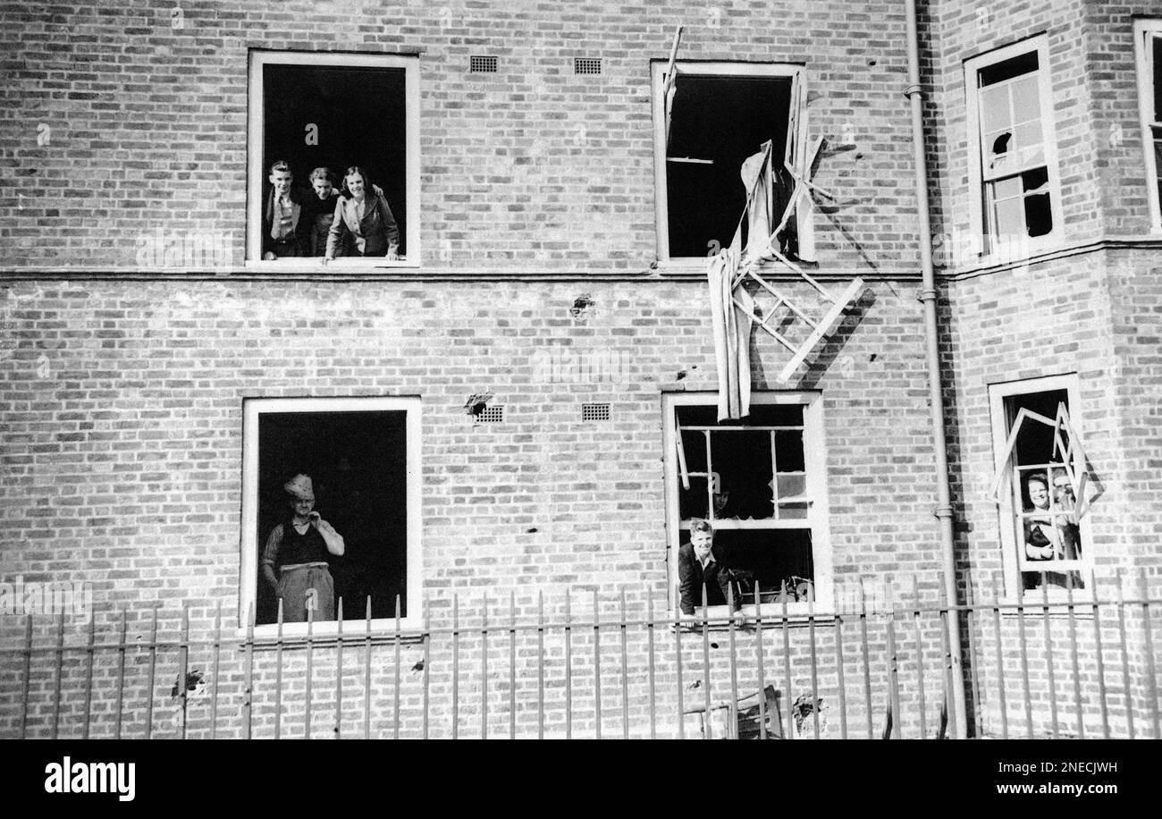 Damage to a block of flats photographed on Sept. 7, 1940 in London ...