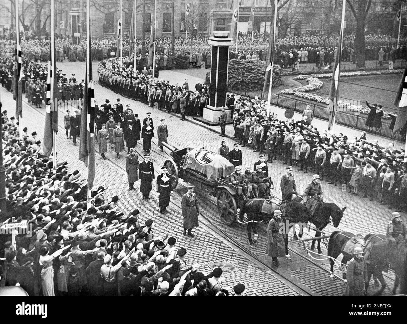 A solemn funeral procession filed through the streets of Dusseldorf ...