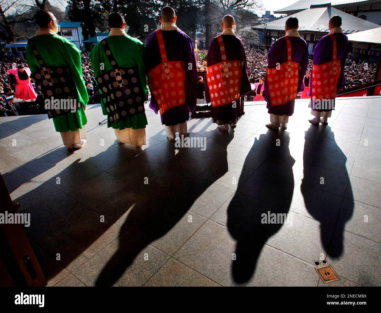 Japanese Buddhist monks pray during bean-throwing ceremony at the ...