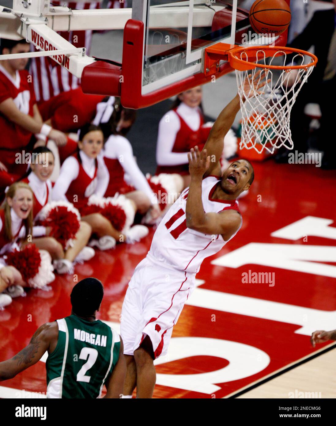 Wisconsin's Jordan Taylor (11) shoots in front of Michigan State's ...