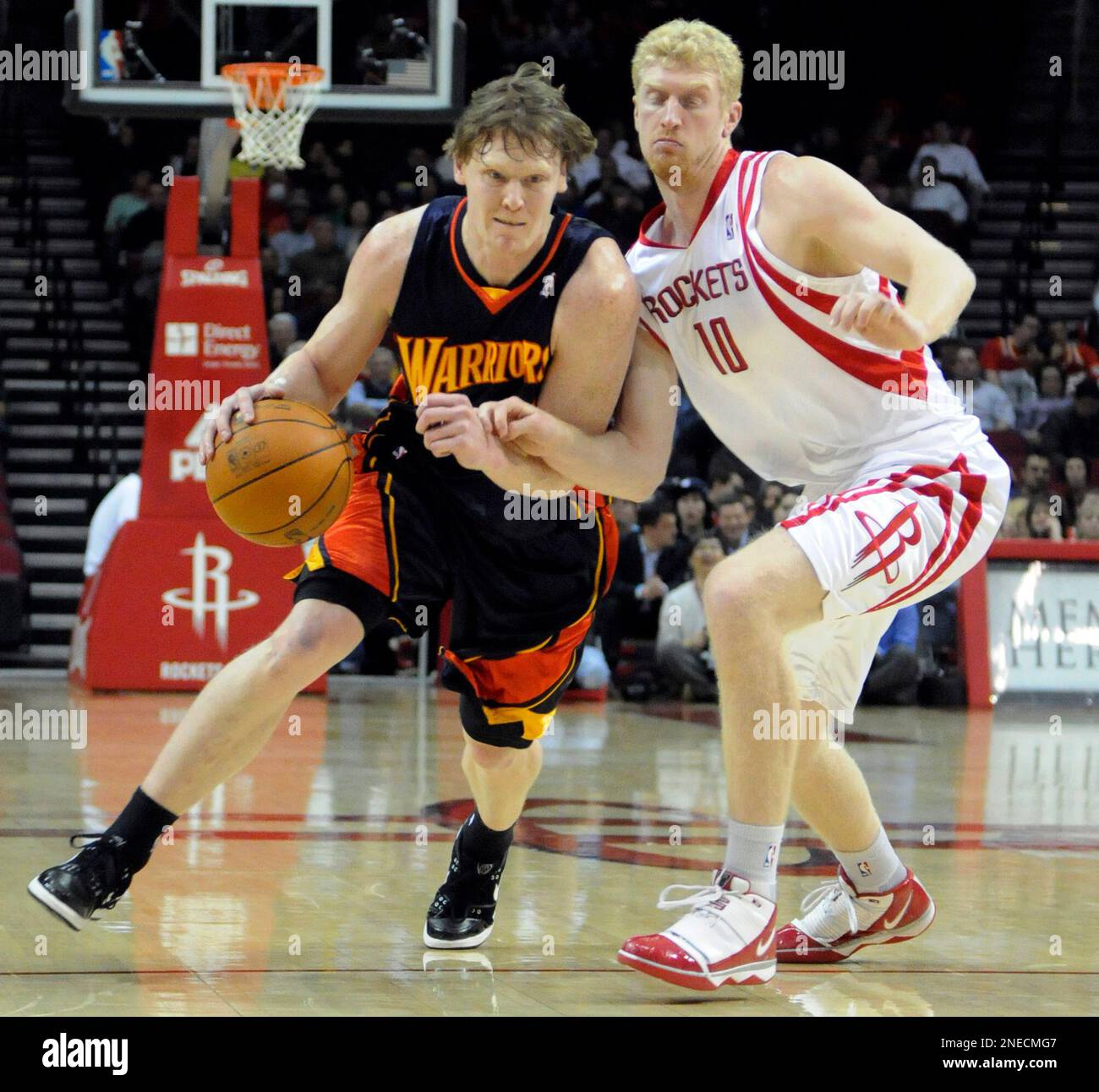 Golden State Warriors' Coby Karl, left, drives the ball past Houston ...