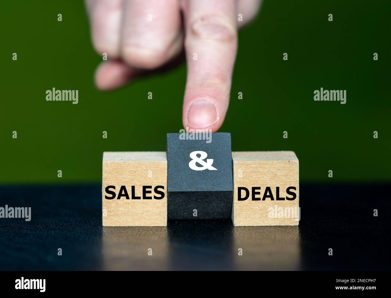 Wooden cubes form the expression 'sales and deals' Stock Photo - Alamy