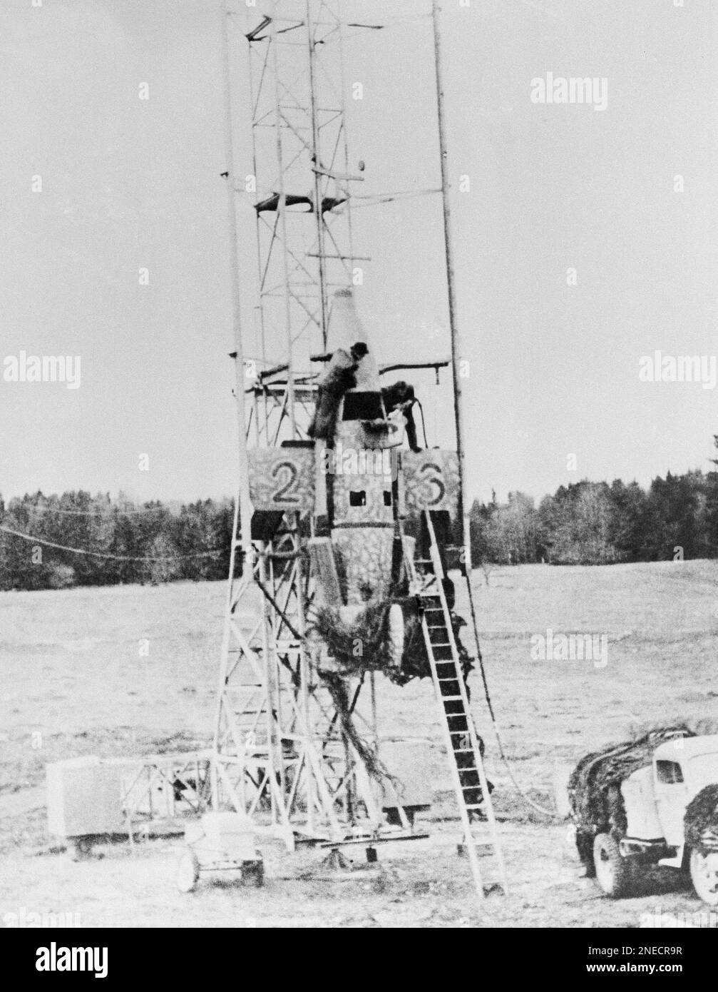 The Viper, a piloted, rocket-propelled missile, is placed on launching ...