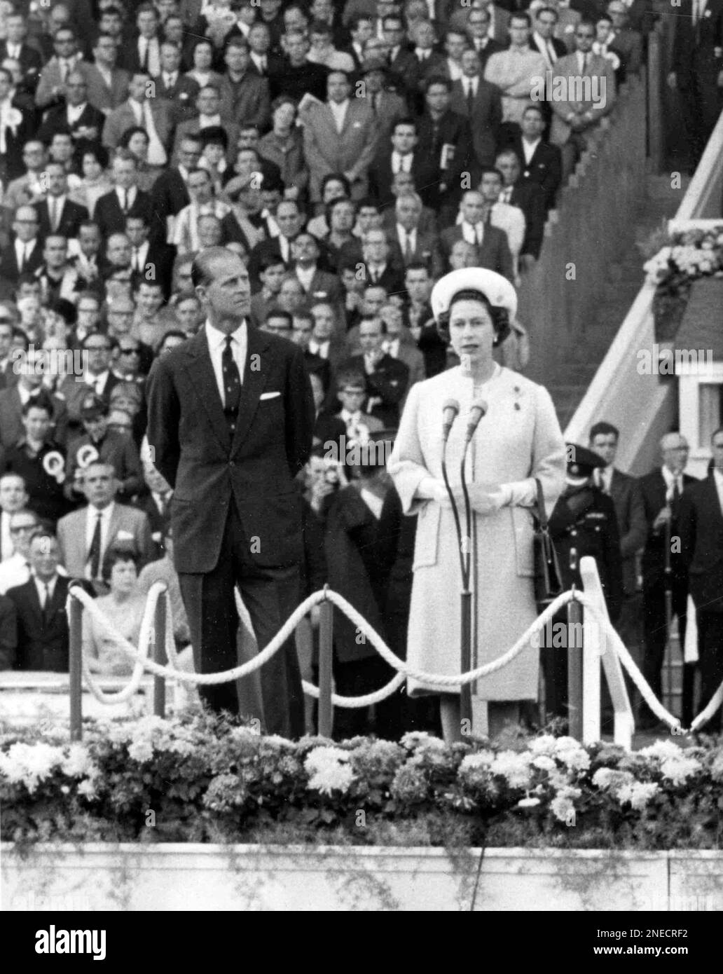 Britain's Queen Elizabeth II addresses the 100,000 crowd as she ...