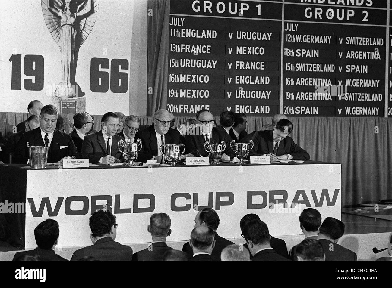 Display boards show the teams selected to play each other in the first ...
