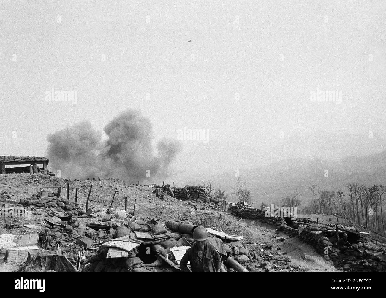 An explosion, background, hits firebase 6 in the central highlands of ...