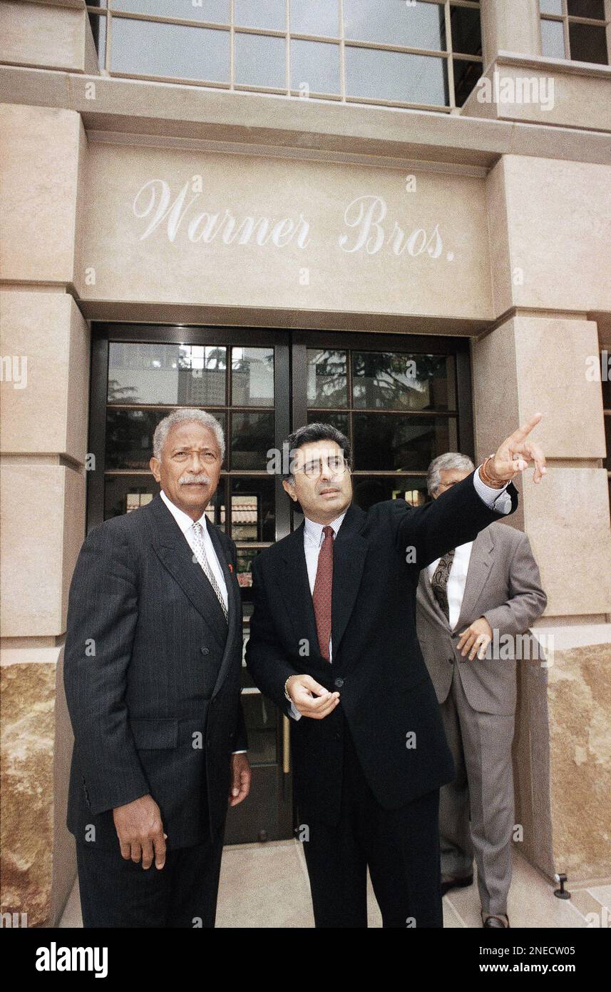 New York City Mayor David Dinkins, left, is shown the sights by Warner ...