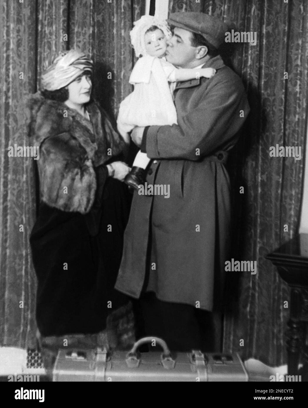 Babe Ruth, bidding his wife Claire Ruth and baby, Dorothy, farewell on ...