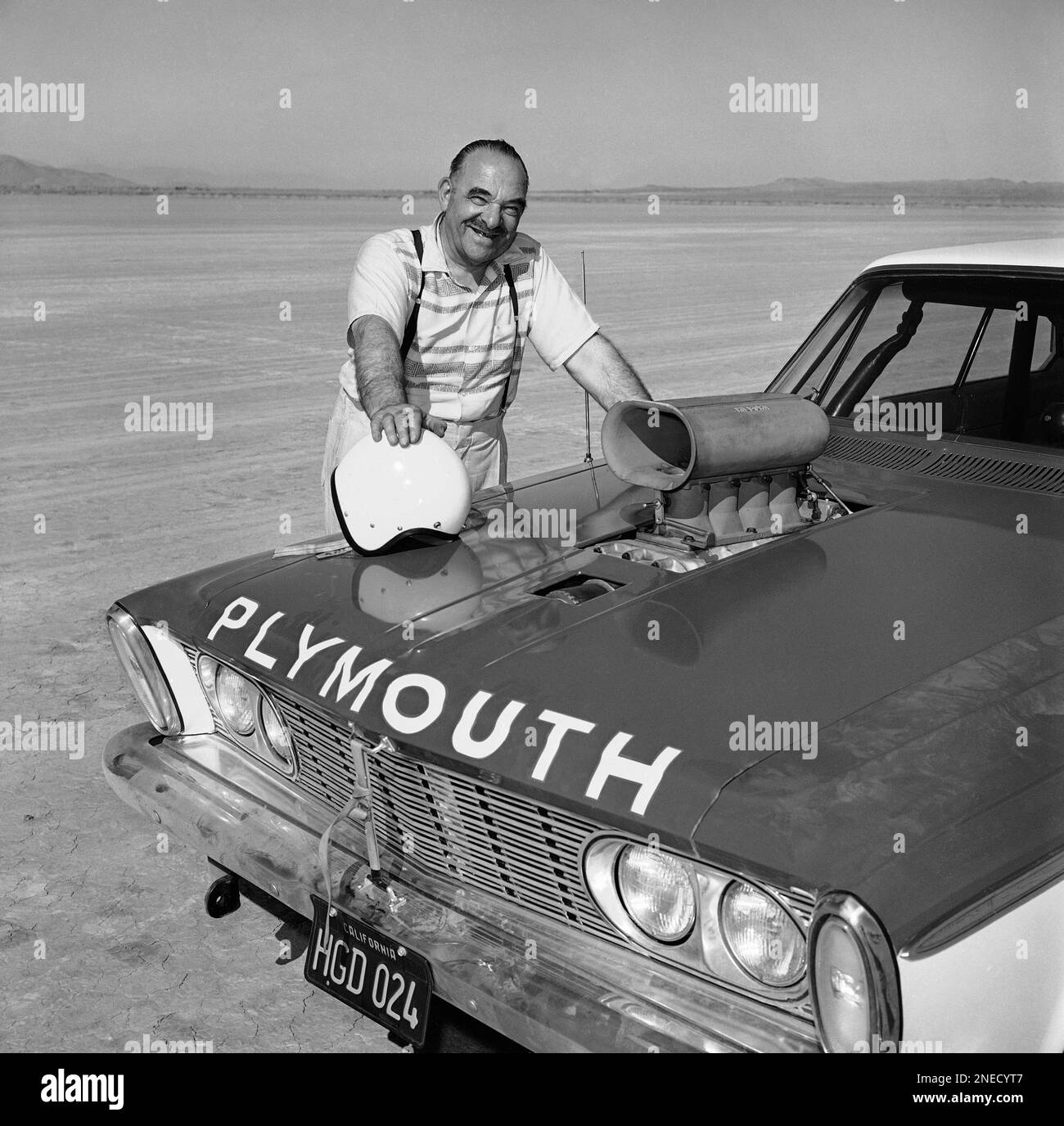 Norm Thatcher, 66-year-old stock car racing driver, poses with the ...