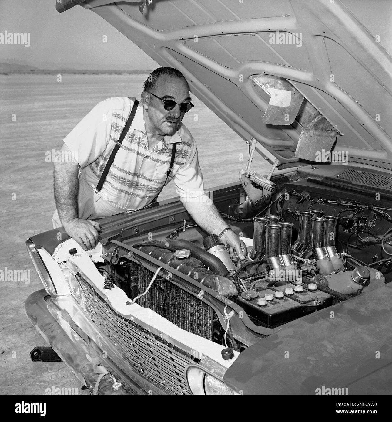 Norm Thatcher, 66-year-old stock car racing driver, poses with the ...