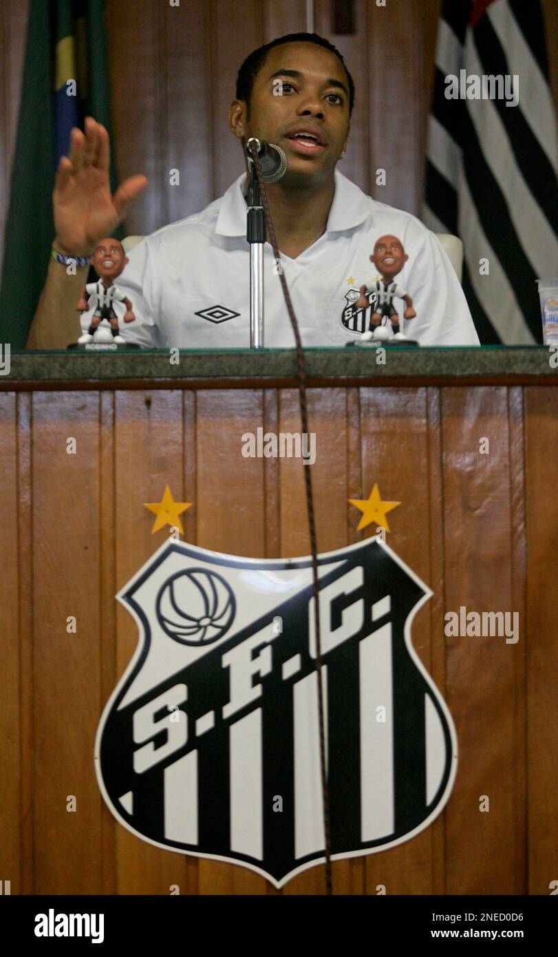 Santos' new player Robinho speaks during a press conference after his ...