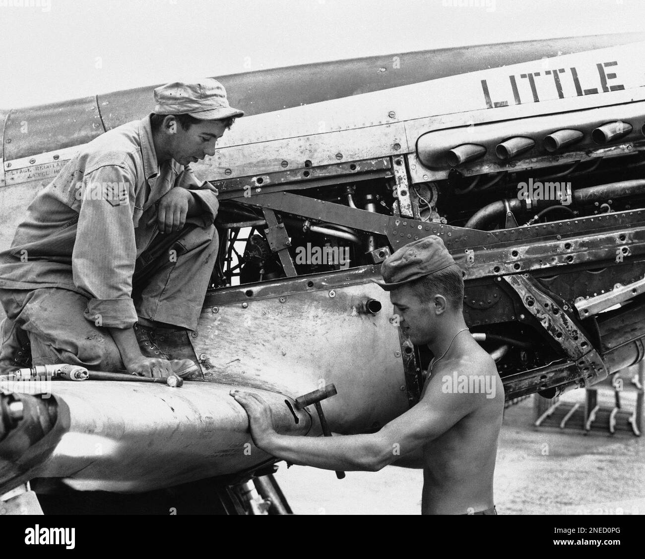 S/Sgt. Paul Kovalchik (left), an aircraft engine-electrical mechanic ...