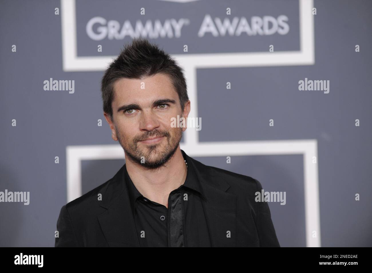 Juanes arrives at the Grammy Awards on Sunday, Jan. 31, 2010, in Los ...